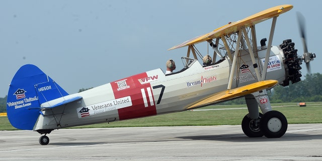 Navy veteran airman, age 100, flies again on vintage World War II pilot ...