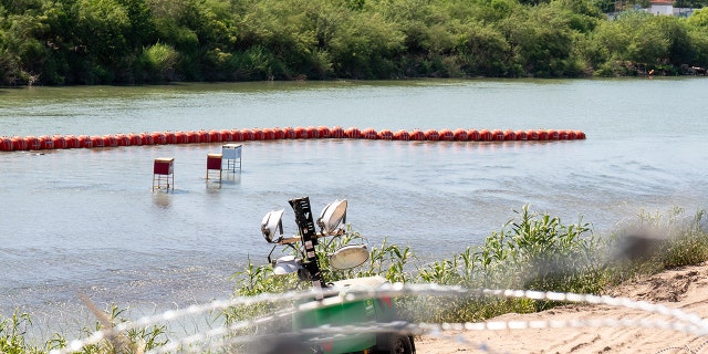 Justice Department files injunction against Texas over floating border ...
